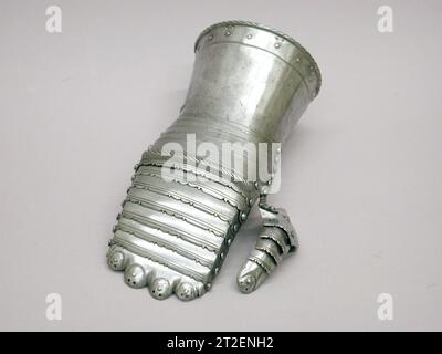 Pair of Gauntlets left gauntlet, early 17th century; right gauntlet ...