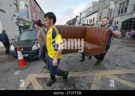 The clean-up continues on Main Street in Midleton, Co. Cork, after ...