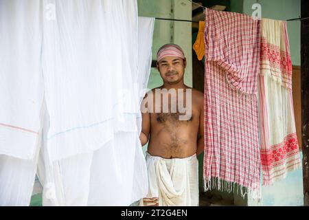 Hindu monk in traditional clothes at the Uttar Kamalabari Hindu ...