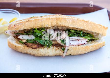 Fried fish sandwich, Balik ekmek, served in a Turkish restaurant ...
