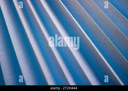 Texture of diagonal stripes with a shadow, with triangular curved ribs ...