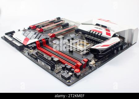 Gaming motherboard without CPU, red details, power switch, POST, on ...