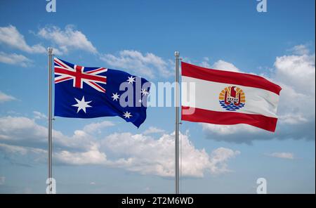 Australia and French Polynesia flags waving together on blue cloudy sky ...