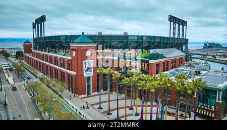 Oracle Park sign with clock aerial of ballpark from above palm trees ...