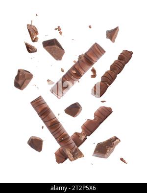 Tasty chocolate bars falling on white background Stock Photo - Alamy