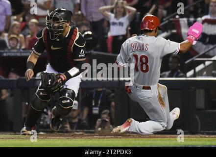 Arizona Diamondbacks catcher Gabriel Moreno tosses a ball into a bucket ...