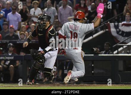 Philadelphia Phillies' Johan Rojas scores during the eighth inning of a ...