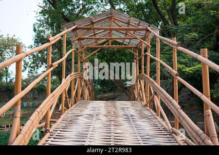 a bridge made of carved bamboo, with a woven floor Stock Photo - Alamy