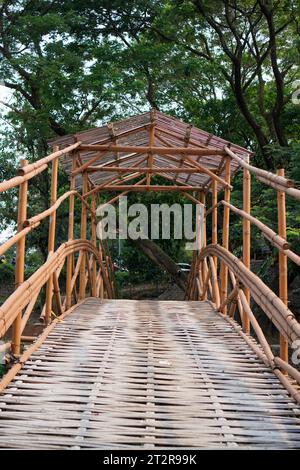 a bridge made of carved bamboo, with a woven floor Stock Photo - Alamy