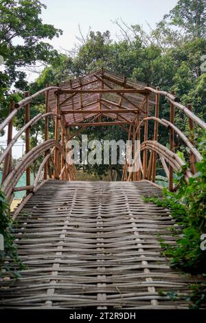 a bridge made of carved bamboo, with a woven floor Stock Photo - Alamy
