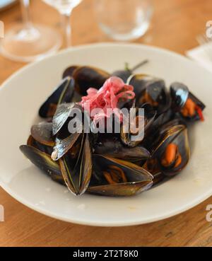 Gourmet portion of Galician mussels in a European seafood restaurant ...