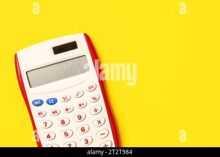 Calculator with number 2024 on yellow background Stock Photo - Alamy