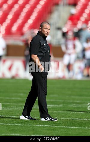 Mississippi State coach Zach Arnett walks onto the field with his team ...