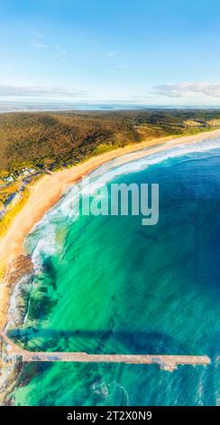 Aerial panorama of Catherine Hill bay beach waterfront with historic ...
