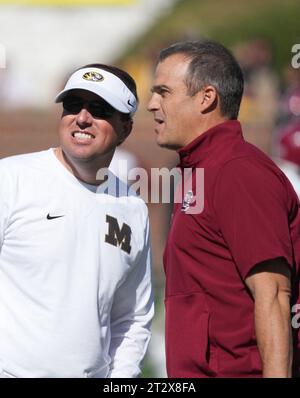 South Carolina head coach Shane Beamer hugs wide receiver Nyck Harbor ...