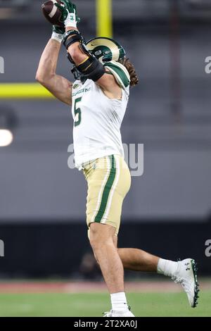 Colorado State tight end Dallin Holker (5) is stopped by Boise State ...