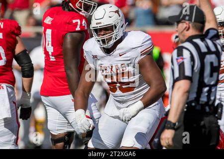 Texas defensive lineman Alfred Collins runs a drill at the NFL football ...