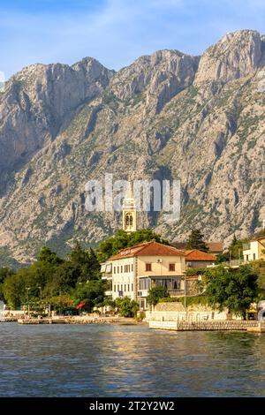Scenic coastline of village of Dobrota in Bay of Kotor, Montenegro, at ...