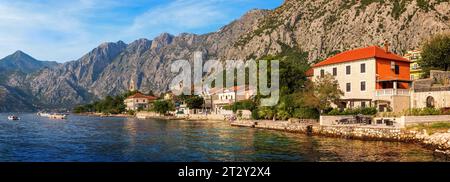 Scenic coastline of village of Dobrota in Bay of Kotor, Montenegro, at ...