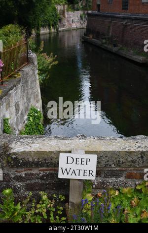 Deep water danger sign at rivers edge Stock Photo - Alamy