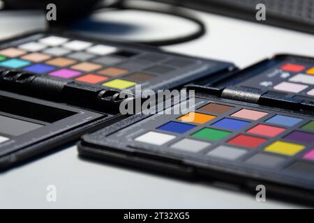 Two X-rite ColorChecker passports (used for color correction) laying on ...