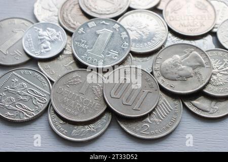 Modern metal coins from different countries, top view, close-up Stock ...