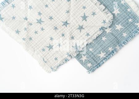Muslin blanket with star pattern on white background Stock Photo - Alamy