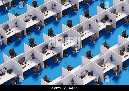 High-angle view of cubicles with tables, chairs, and computers in a ...