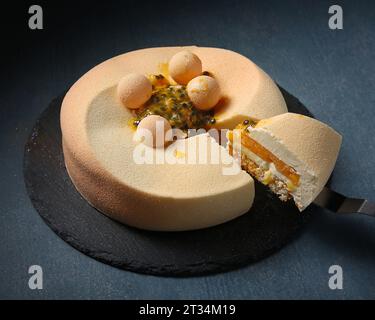 Exotic mousse cake with pasiflora, mango, mascarpone mousse Stock Photo ...