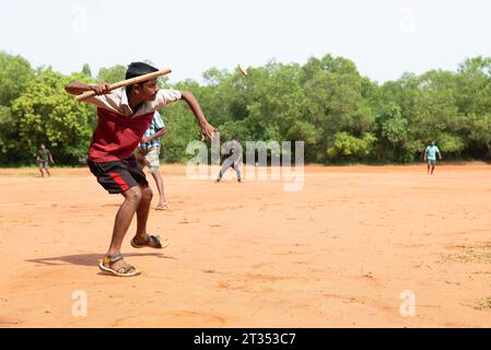 Auroville, India - August 2023: Playing Gilli Danda, the traditional ...