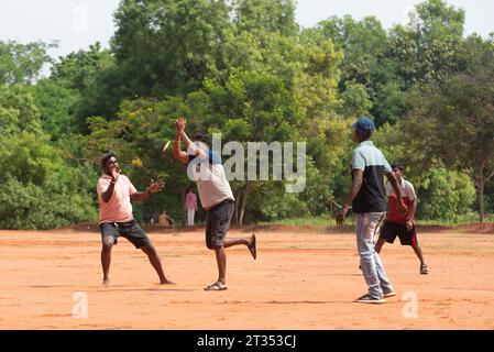 Auroville, India - August 2023: Playing Gilli Danda, the traditional ...