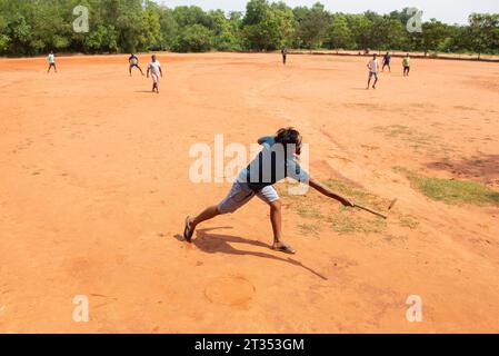 Auroville, India - August 2023: Playing Gilli Danda, the traditional ...