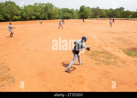 Auroville, India - August 2023: Playing Gilli Danda, the traditional ...