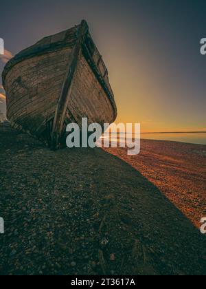 Rustic wooden boat stranded on Barbosa beach, São José de Ribamar MA ...