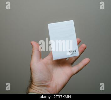 Paris, France - May 30, 2023: Confident male hand expertly displays an ...