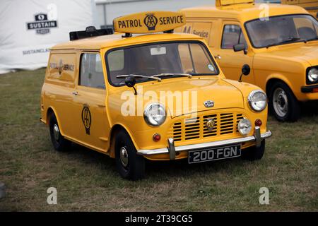 Three-quarters front view of an AA Patrol Services, Yellow, 1963 ...