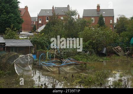 Debris and flood water in allotments in Retford, Nottinghamshire, after ...