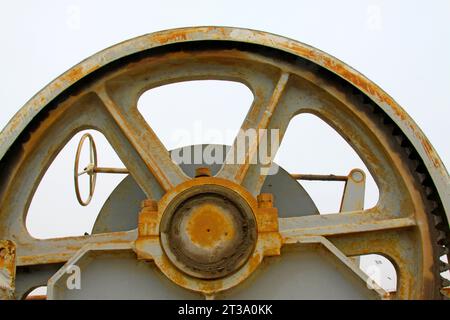 Metal parts with greasy dirt in a factory Stock Photo - Alamy