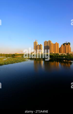 Unfinished buildings are in a city, North China Stock Photo - Alamy