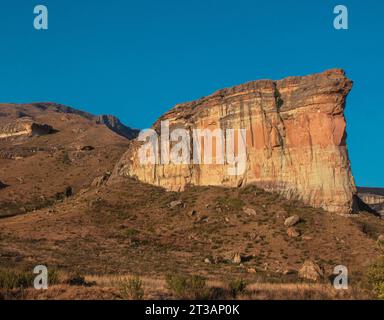 large tall cliff with sunlight; Brandwag Buttress impressive sandstone ...