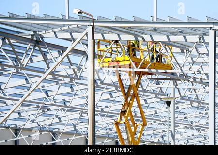 Complex large volume steel frame structure assembly using self ...