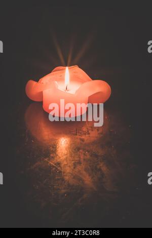 one burning candle with reflection against black background Stock Photo ...