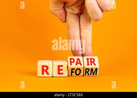 Reform and repair symbol. Concept words Reform Repair on wooden block ...