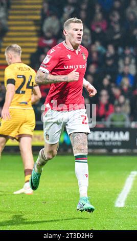 James McClean 23# of Wrexham Association Football Club warms up, during ...