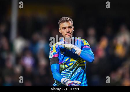 Goalkeeper Jack Stevens (1 Cambridge united) clears the ball from Matty ...