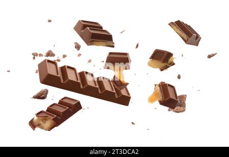 Whole and broken chocolate bars falling on white background Stock Photo ...