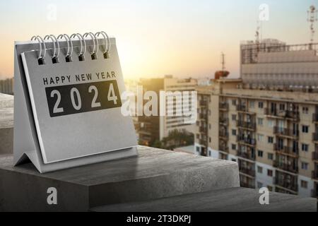 Calendar of 2024 with cityscapes background. Happy New Year 2024 Stock Photo - Alamy