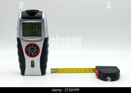 Ultrasonic distance meter isolated on white background Stock Photo - Alamy