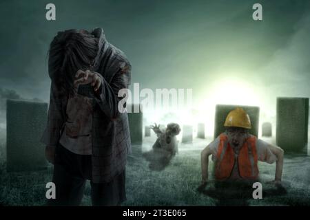 A group of scary zombies with blood and wounds on their bodies are ...