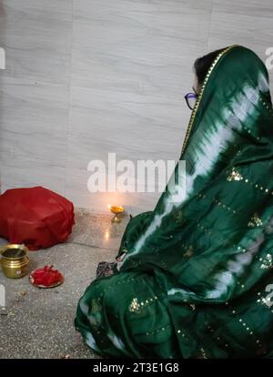 indian women doing holy rituals at home for children's wellbeing from ...